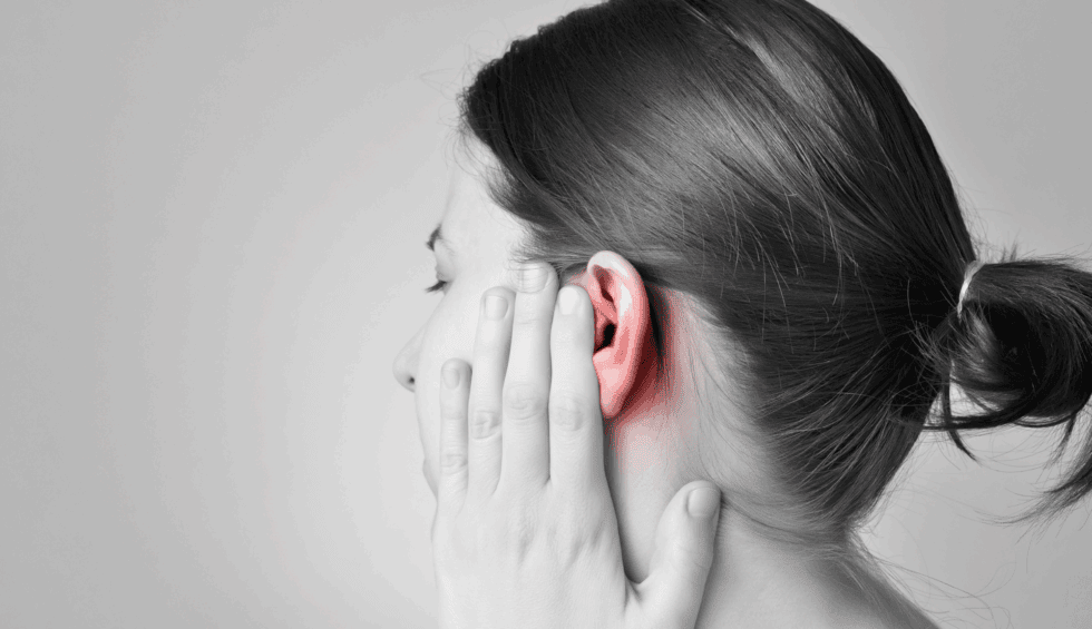Hearing Fluid in Your Ear? What It Means & How to Fix It